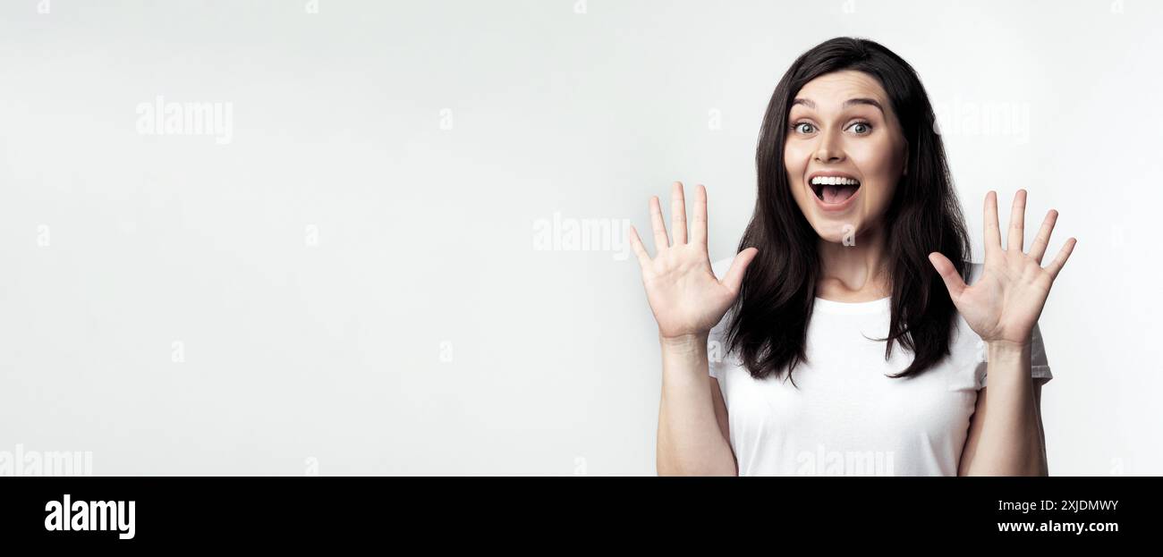 Friendly woman arms raising hi-res stock photography and images - Alamy