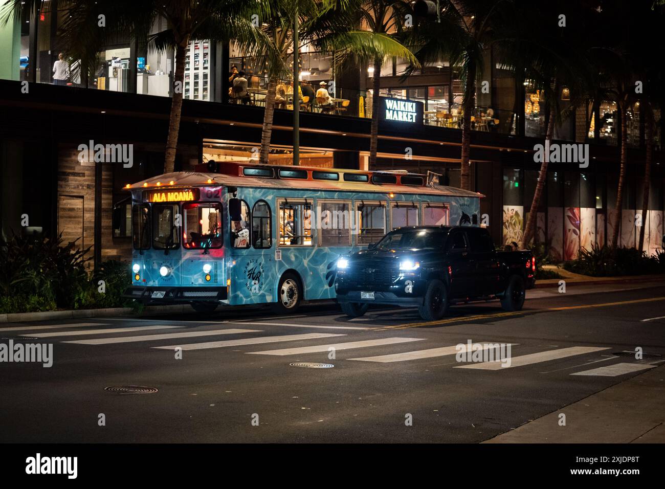 Night Bus in Waikiki Stock Photo - Alamy
