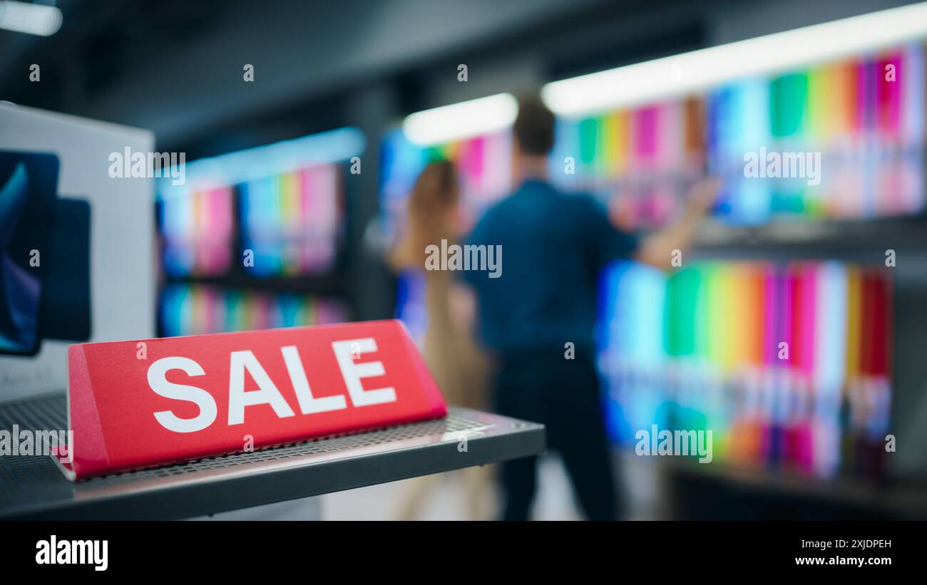 Close Up of a Red Sale Sign in a Home Electronics Department Store with ...