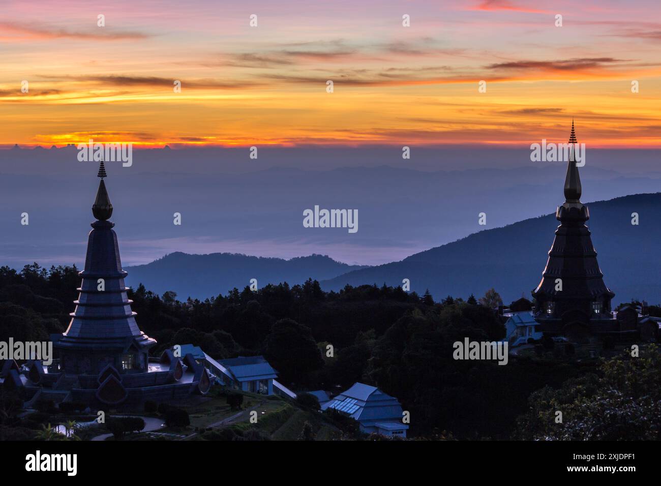 two famous pagodas and colorful sky at sunrise. Doi Inthanon national ...