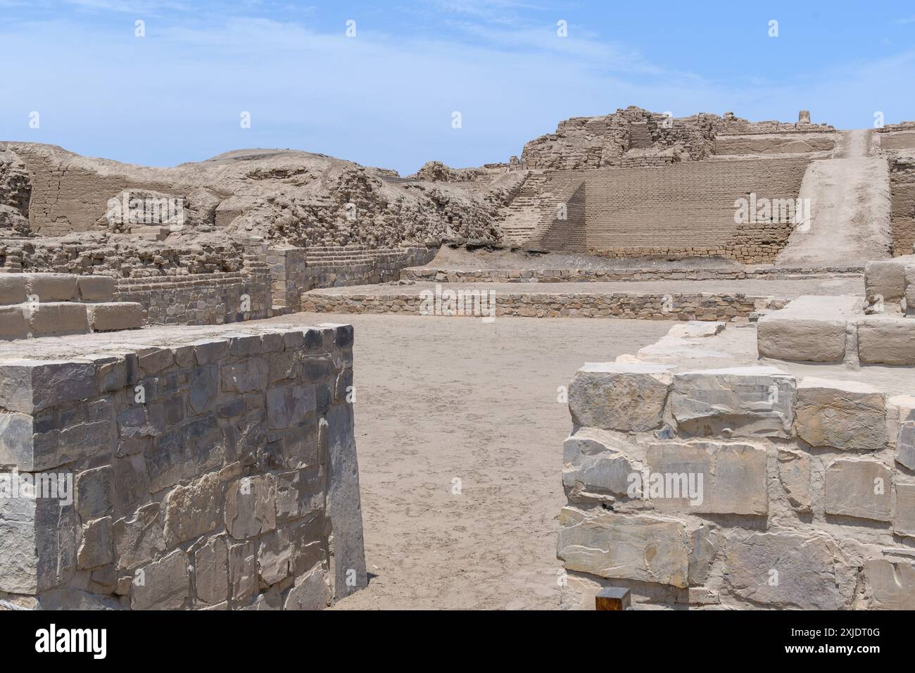 Ancient ruins under a clear blue sky. Ancient city ruins stand against ...