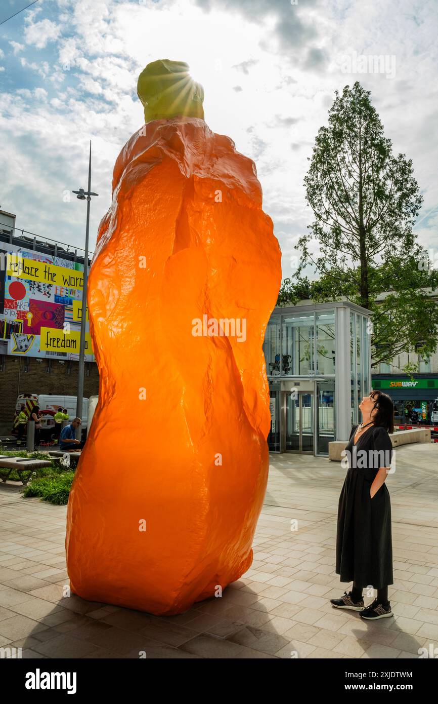 London, UK. 18th July, 2024. Ugo Rondinone's 5 metre orange yellow ...
