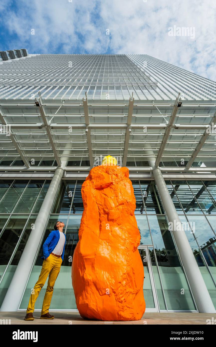 London, UK. 18th July, 2024. Ugo Rondinone's 5 metre orange yellow ...