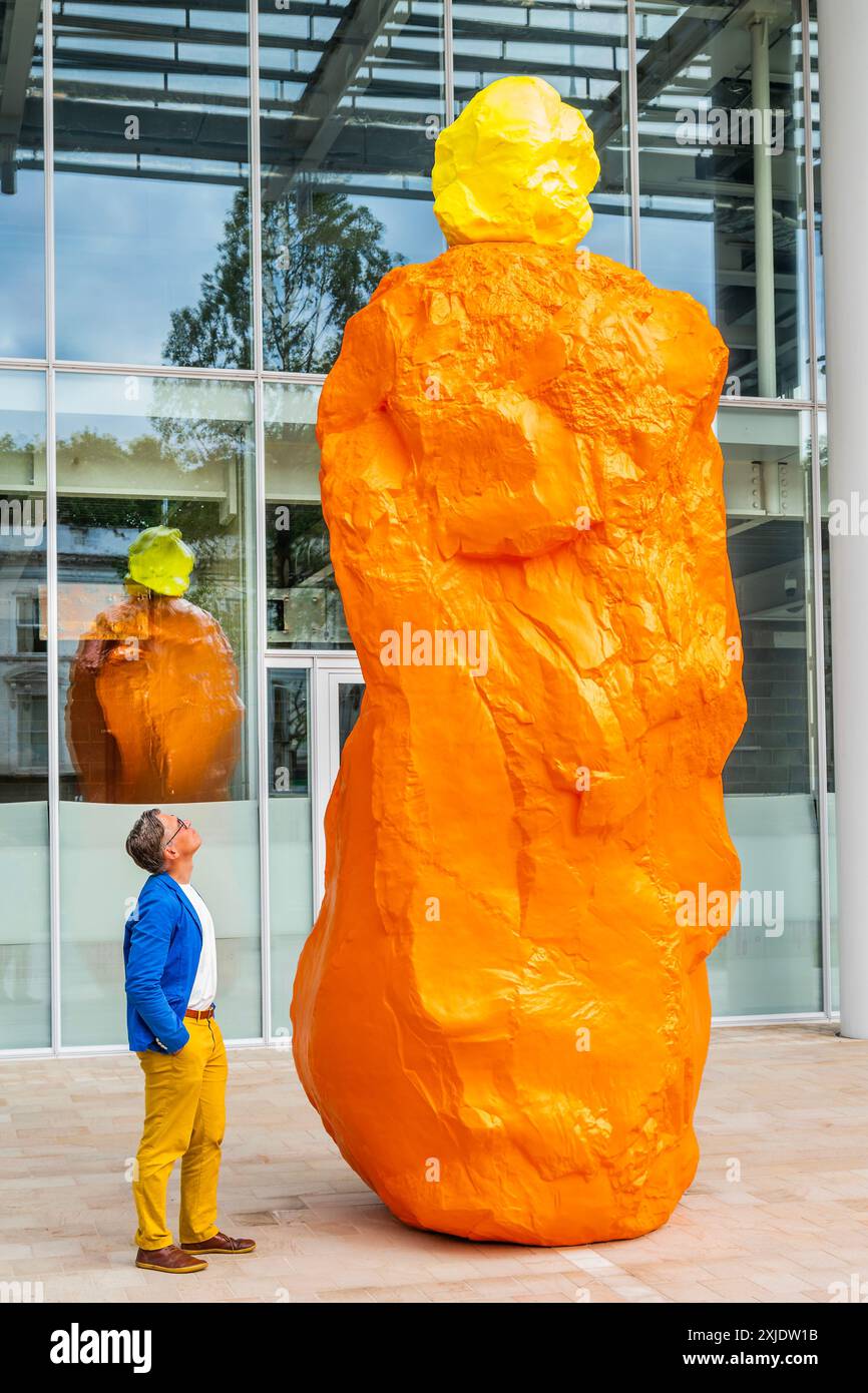 London, UK. 18th July, 2024. Ugo Rondinone's 5 metre orange yellow ...