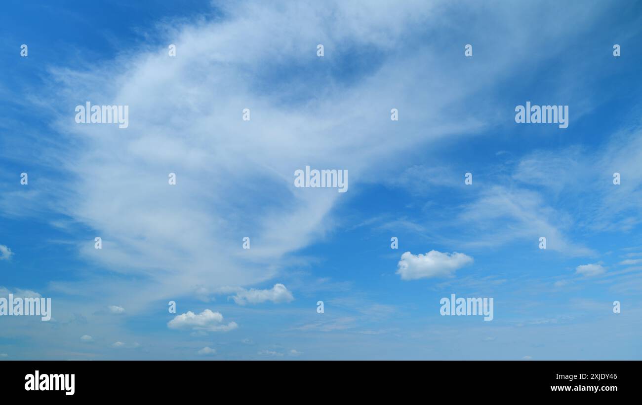 Time lapse. Soft white clouds moving on blue sky background. Tropical ...