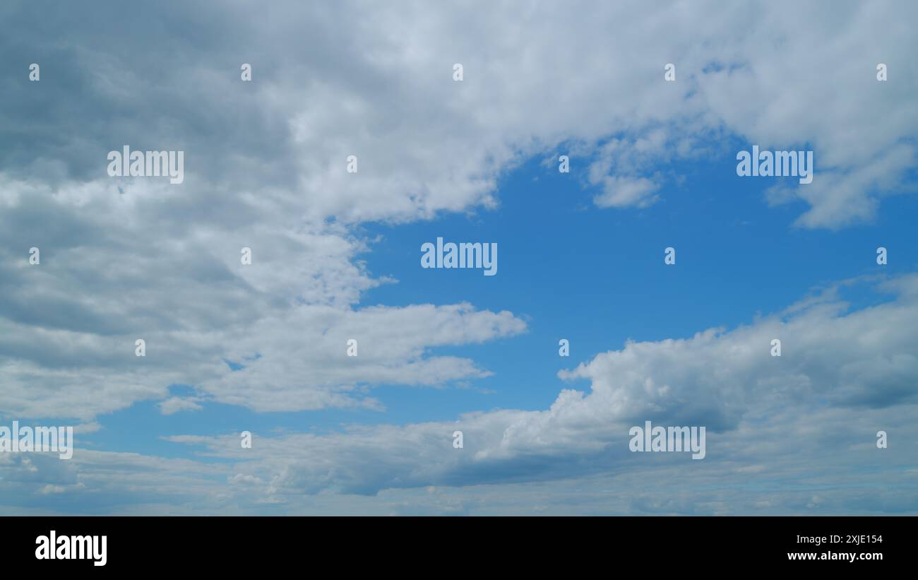 Time lapse. Majestic amazing blue sky with clouds. Clouds move in the ...