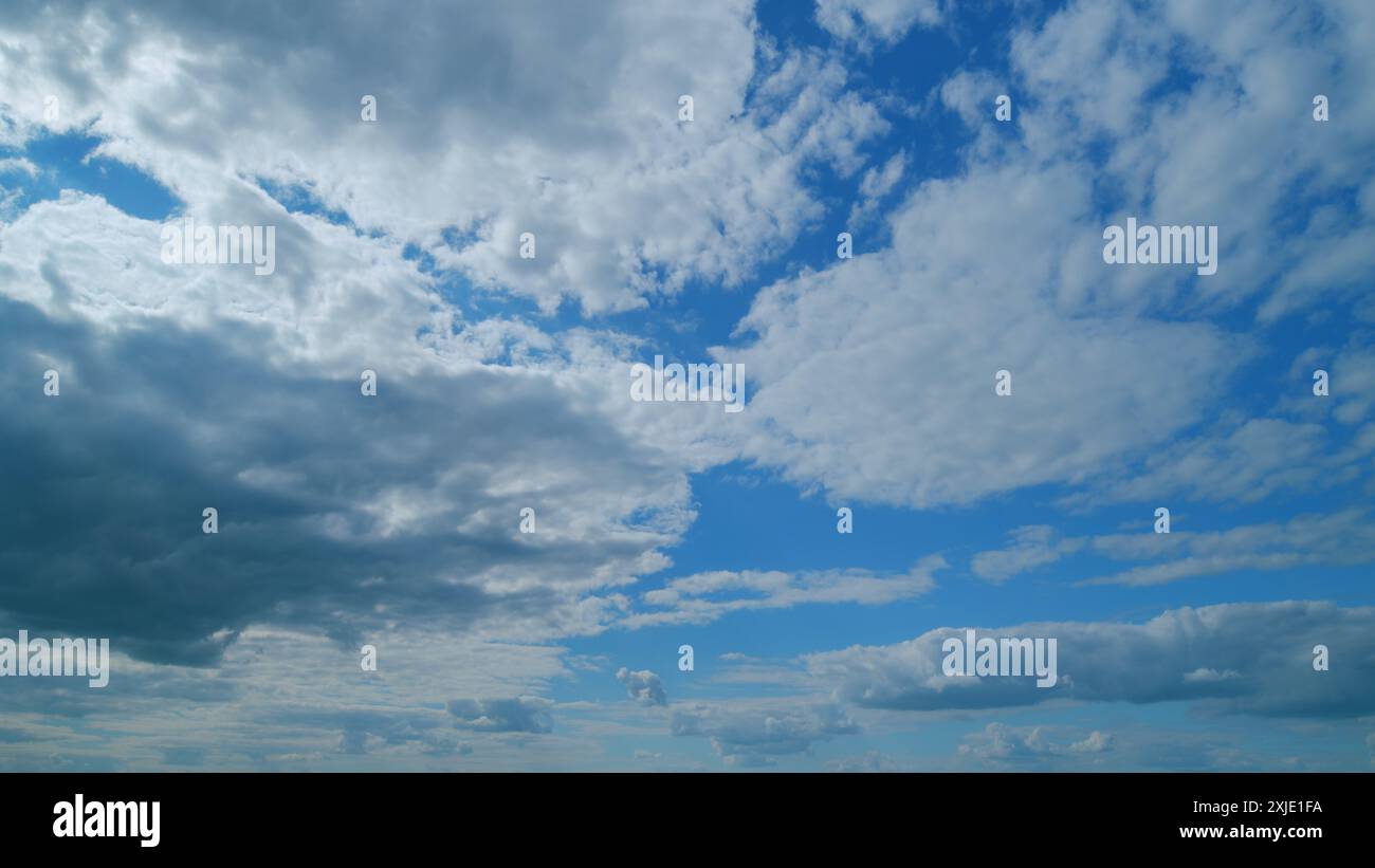 Time lapse. Summer clouds float across blue sky. Blue sky white clouds ...