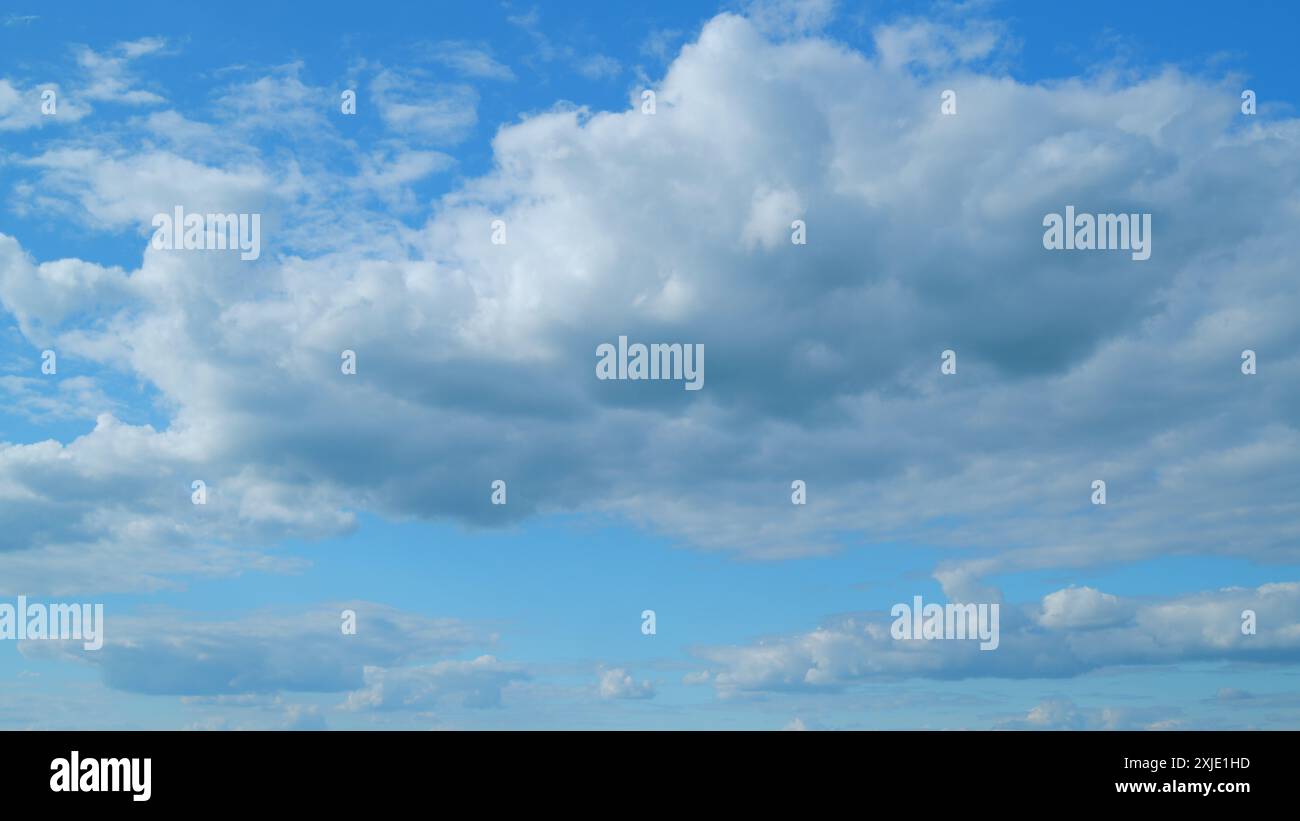 Cinematic timelapse fluffy clouds moving hi-res stock photography and ...