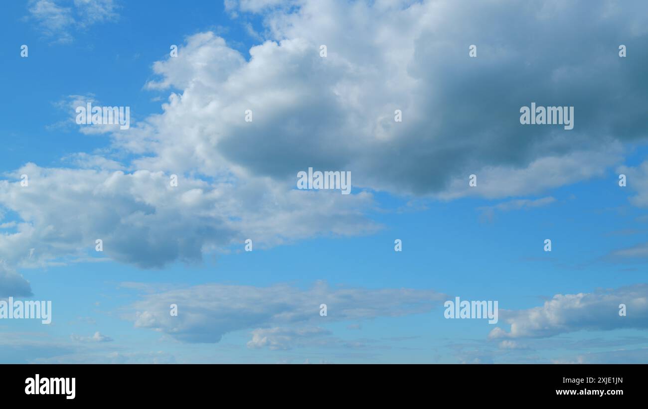 Puffy fluffy white clouds forming hi-res stock photography and images ...