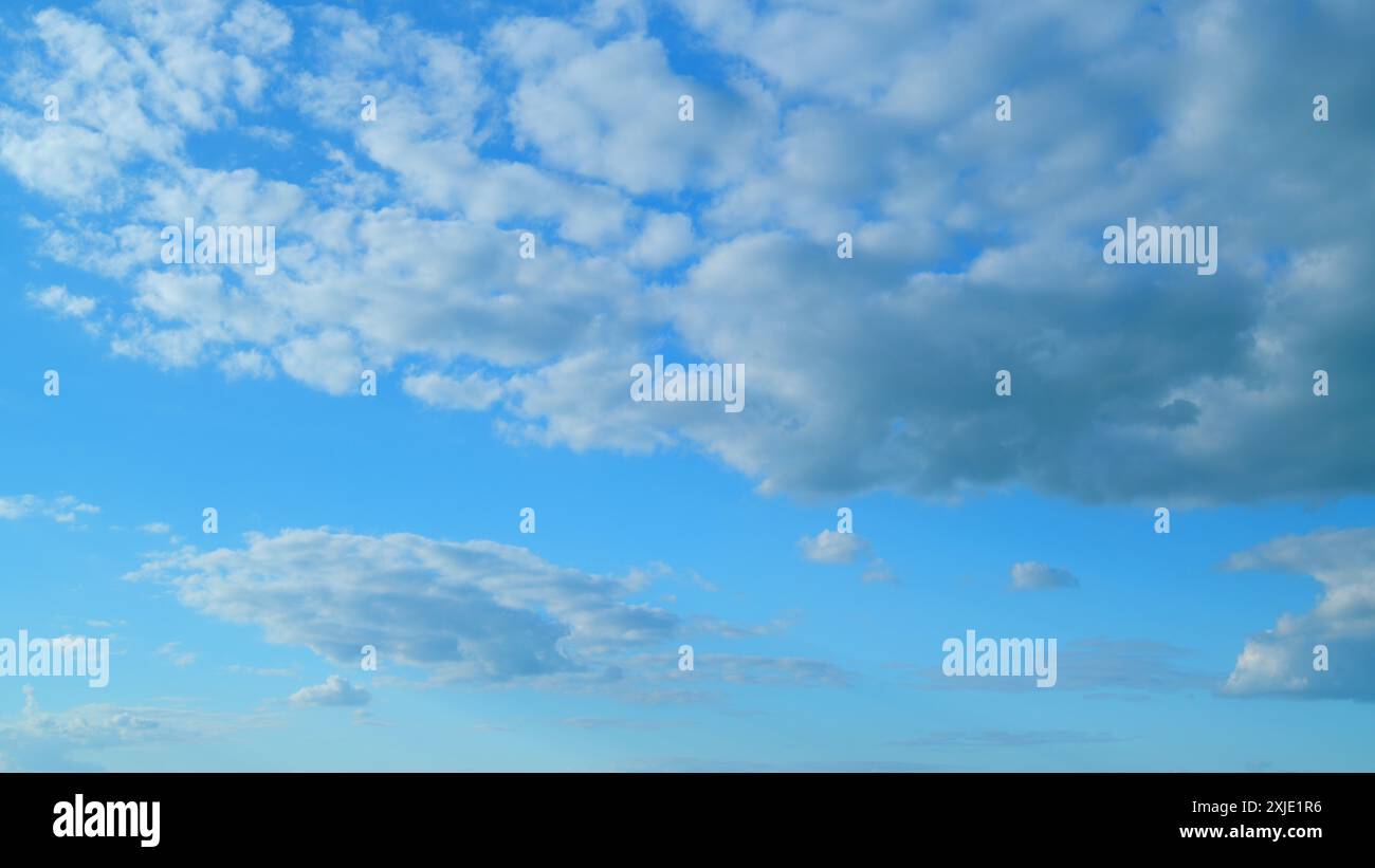 Time lapse. Puffy fluffy white clouds. Forming cloud moving with blue sunny, summer skies Stock ...