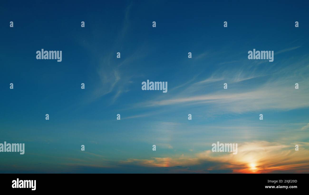 Time lapse. Crescent moon and red purple cloudscape background and dark ...