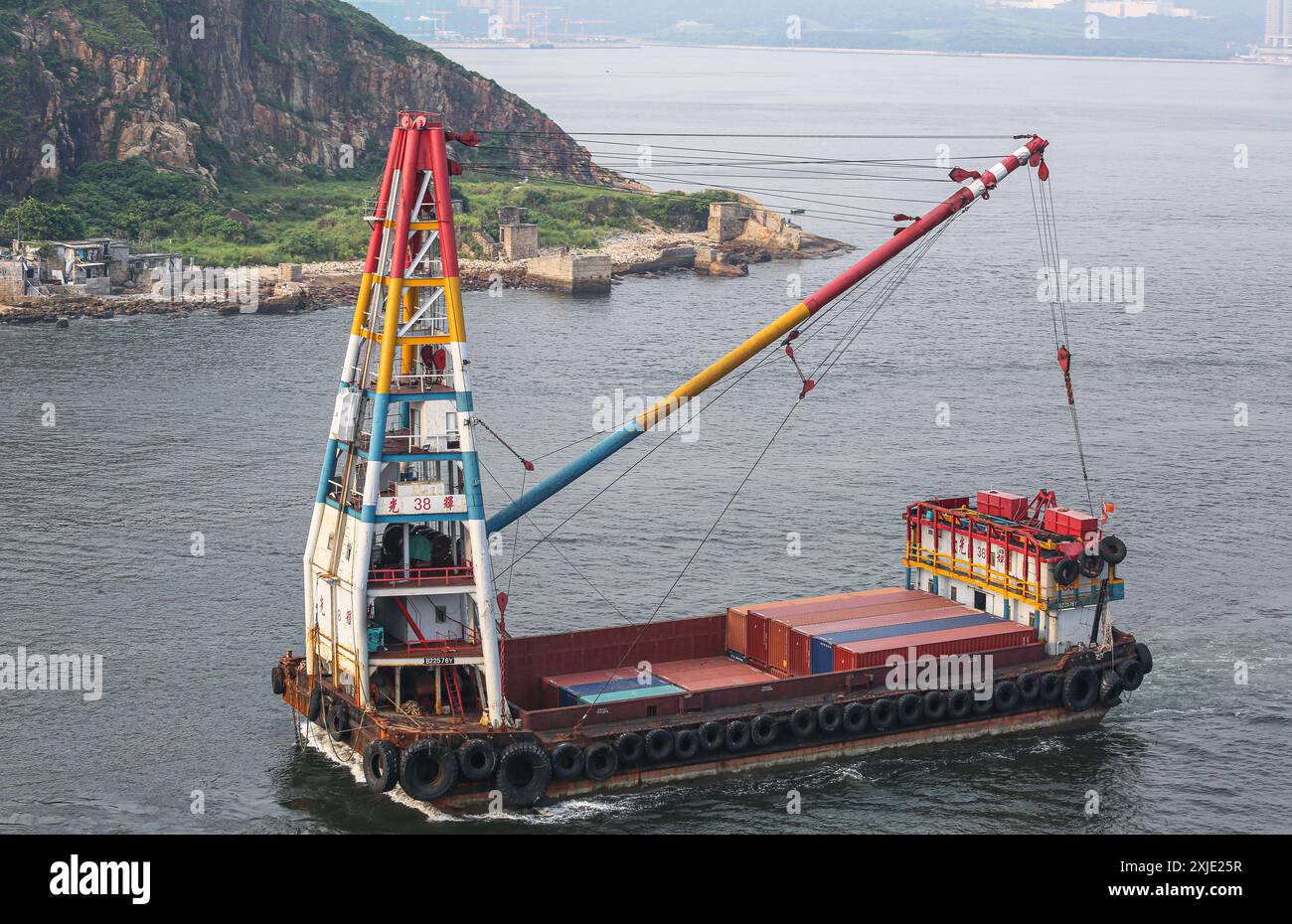 Hong Kong, China : crane barge carrying containers unloaded from a ...