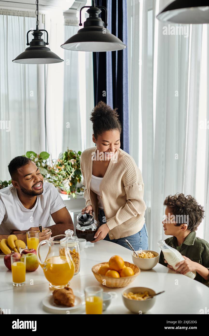Caucasian family sitting around table hi-res stock photography and ...