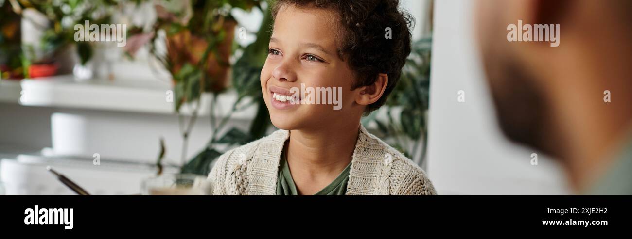 African american child seated hi-res stock photography and images - Alamy