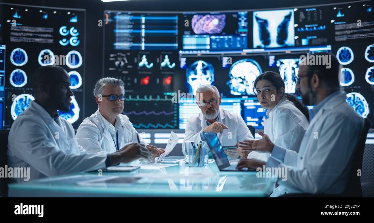 Chief Doctor Conducting a Pre-Operative Assessment Meeting With His ...