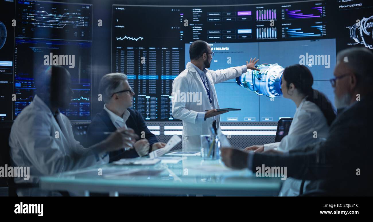 Group of Industrial Engineers Having a Meeting in a Research and ...