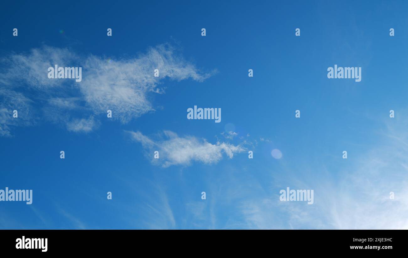 Time lapse. Blue sky white puffy fluffy clouds billow in high space. Sky with clouds weather ...