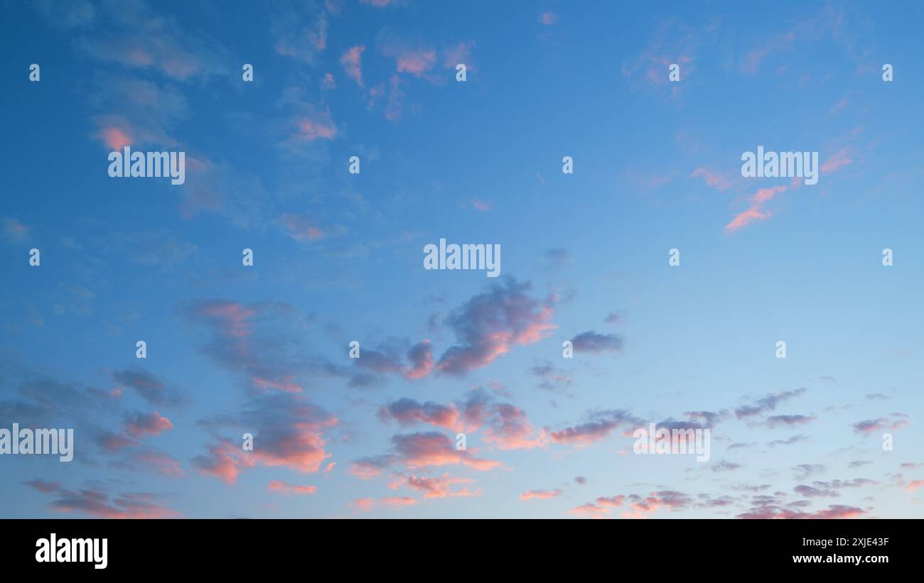 Time lapse. Fiery sunset clouds sky. Clear very nice soft deep blue sky ...
