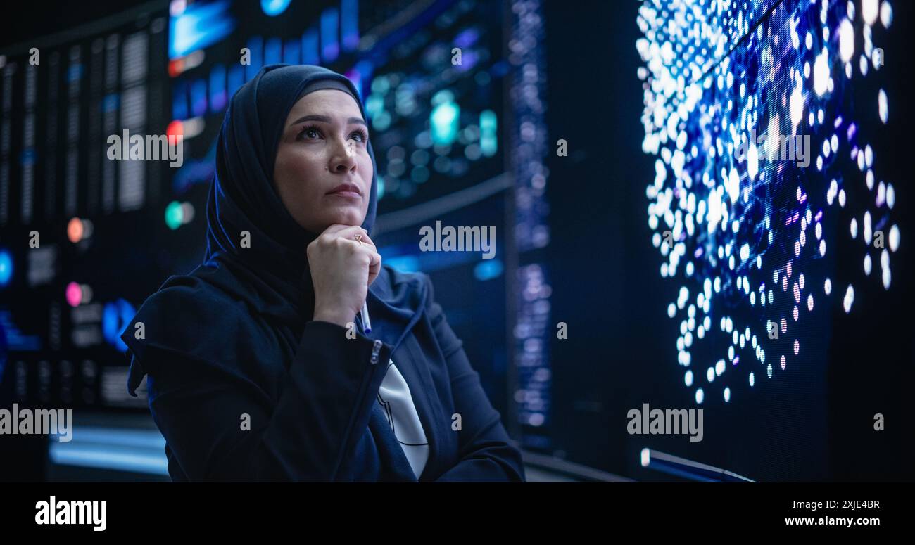 Portrait of a Smart Focused Middle Eastern Software Engineer Analyzing ...