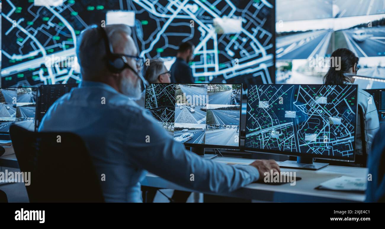 Technical Customer Support Specialist is Talking on a Headset while ...