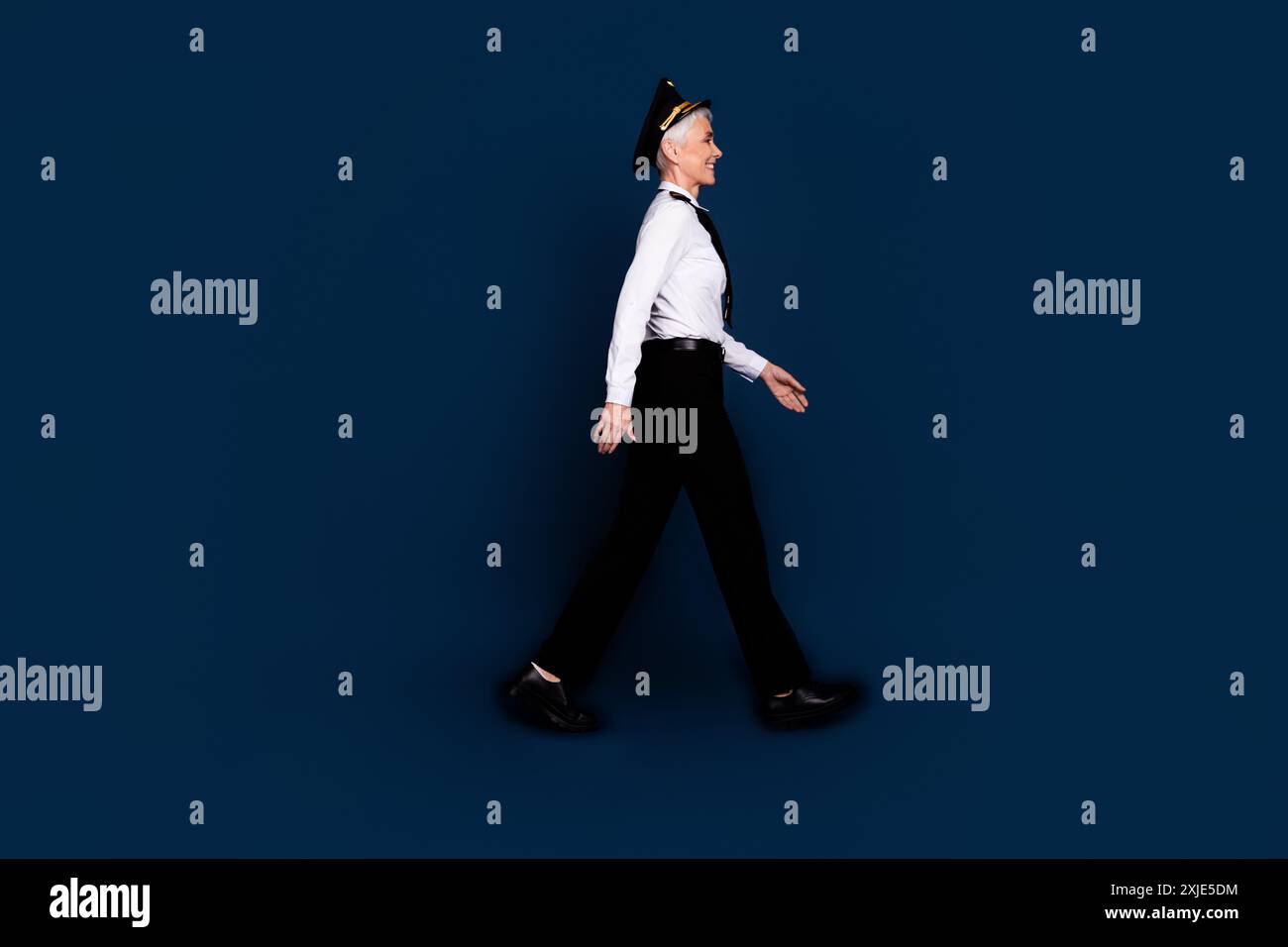 Full size photo of pretty retired female professional airline pilot ...