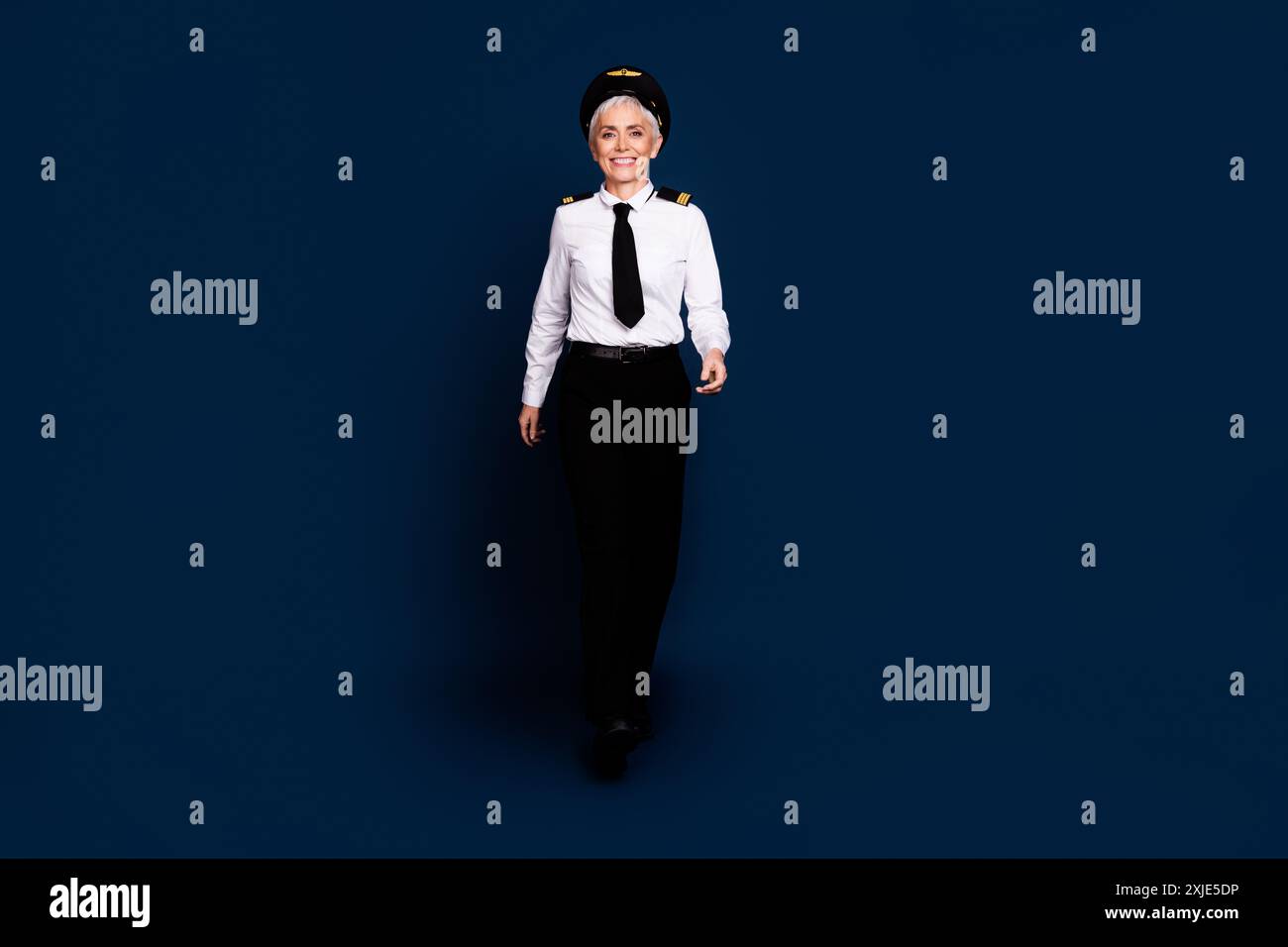 Full Body Photo Of Attractive Senior Woman Passenger Plane Captain Walking Dressed Aviator