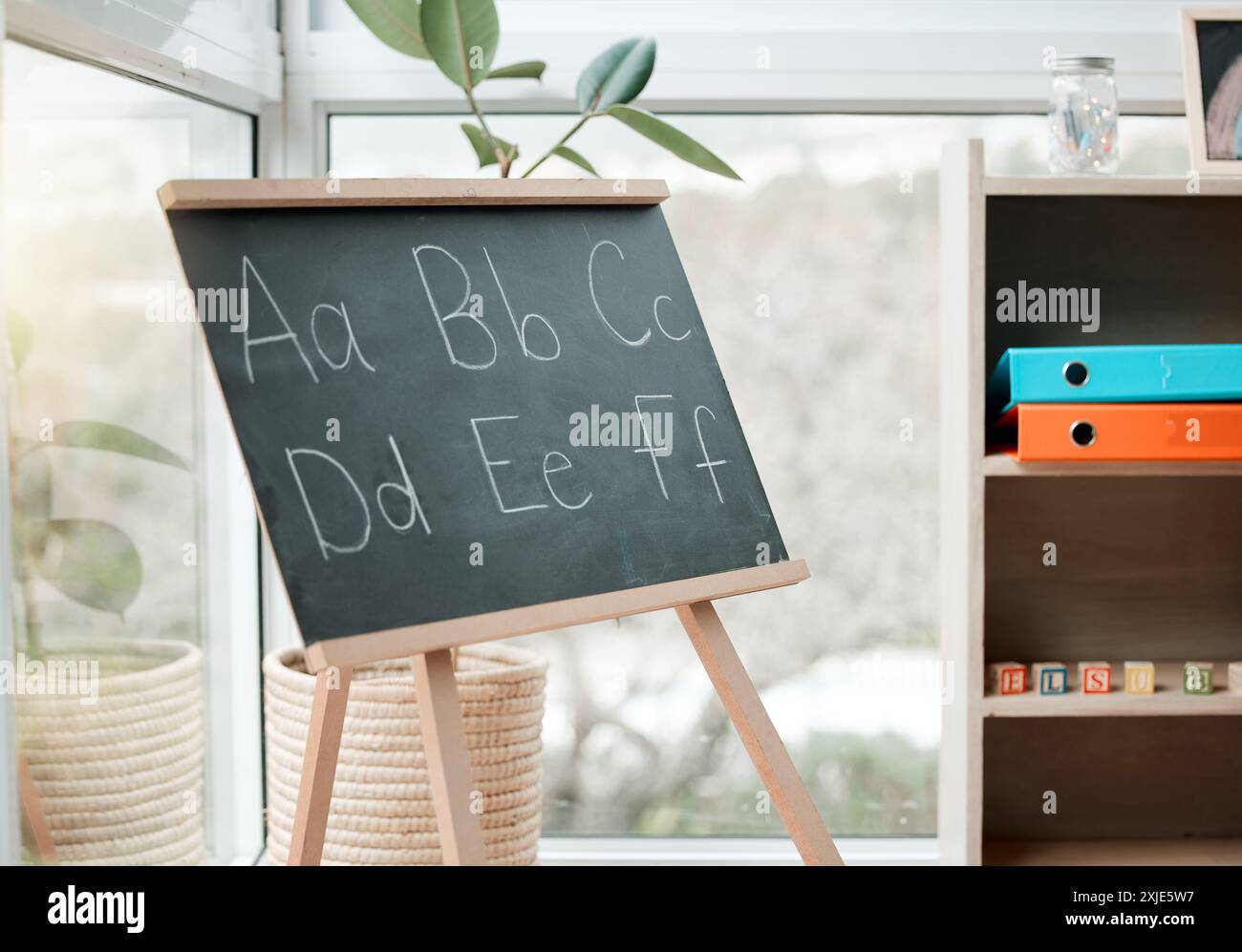 Alphabet, blackboard and education for lesson in house with letters ...