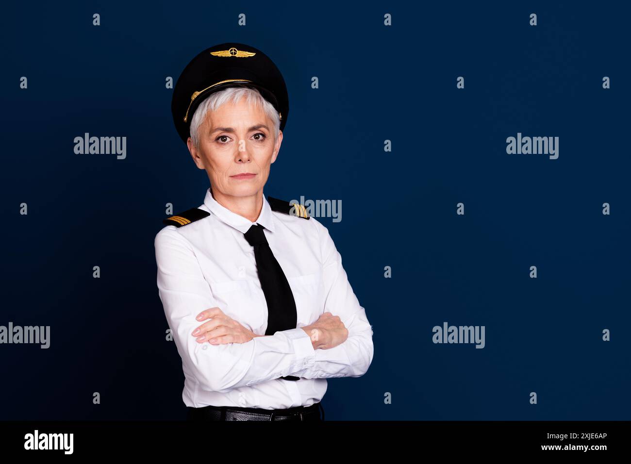 Photo of attractive senior woman passenger plane captain crossed hands ...