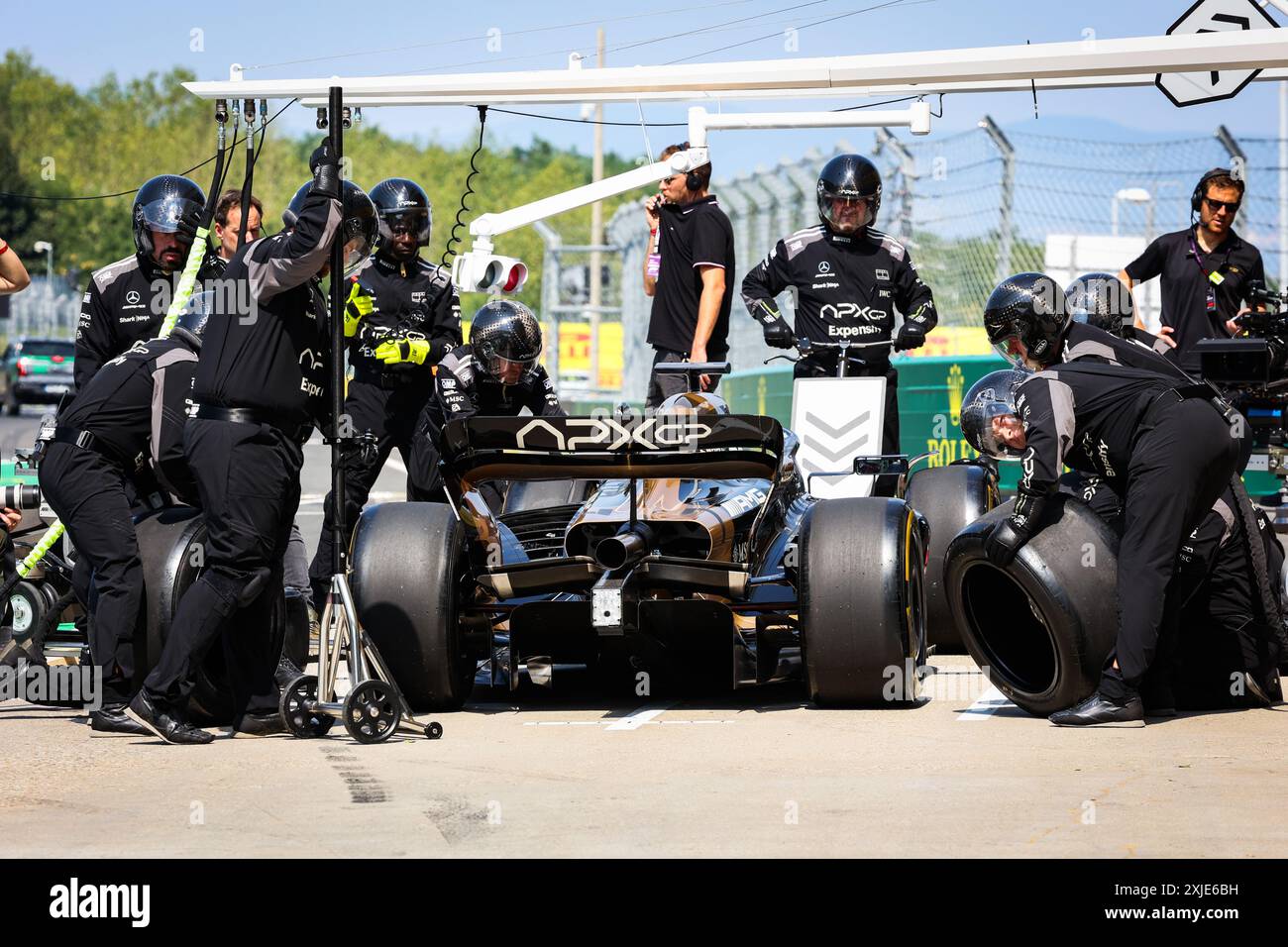 APEX APXGP backstage of the Team crew filming a pitstop pit stop for ...