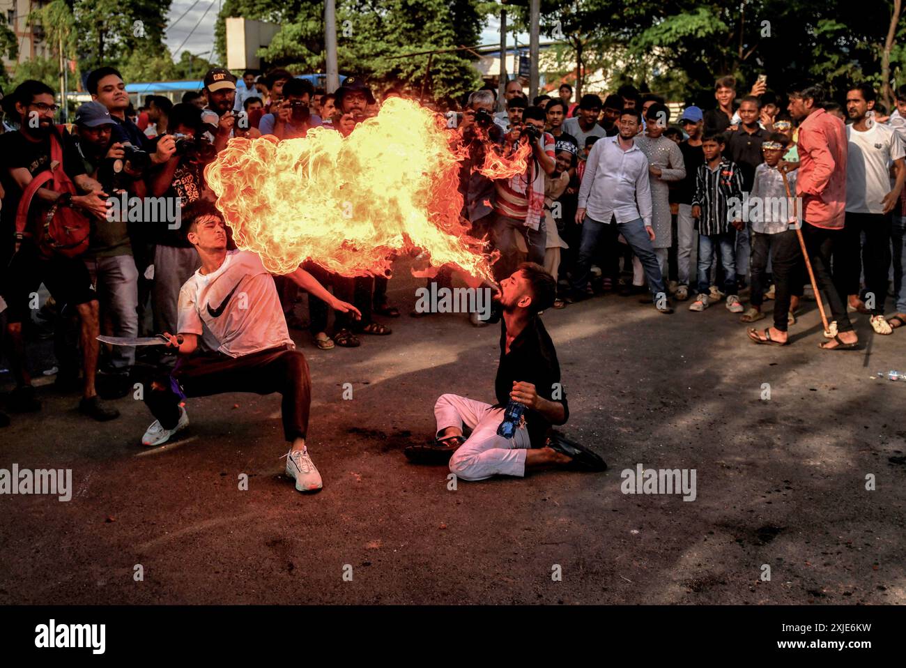 Indian Shiite Muslim fire eaters perform stunts on the occasion of ...