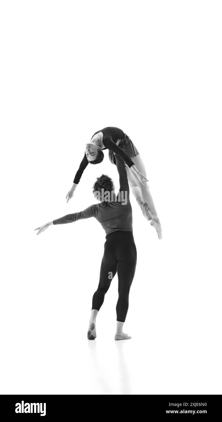 Fluidity and strength. Man and woman, ballet pair practice together ...