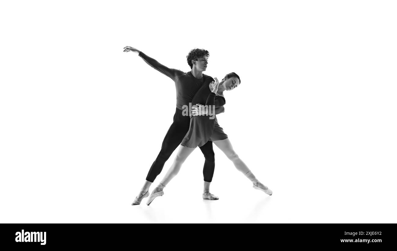 Precision and grace in motion. Ballet dancers, partners training ...