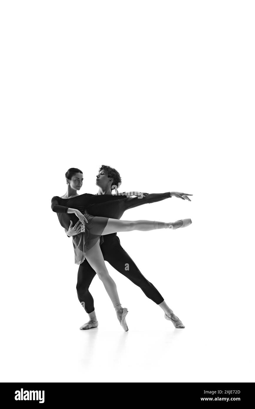 Ballet duo, man and woman perfecting their graceful dance moves in ...