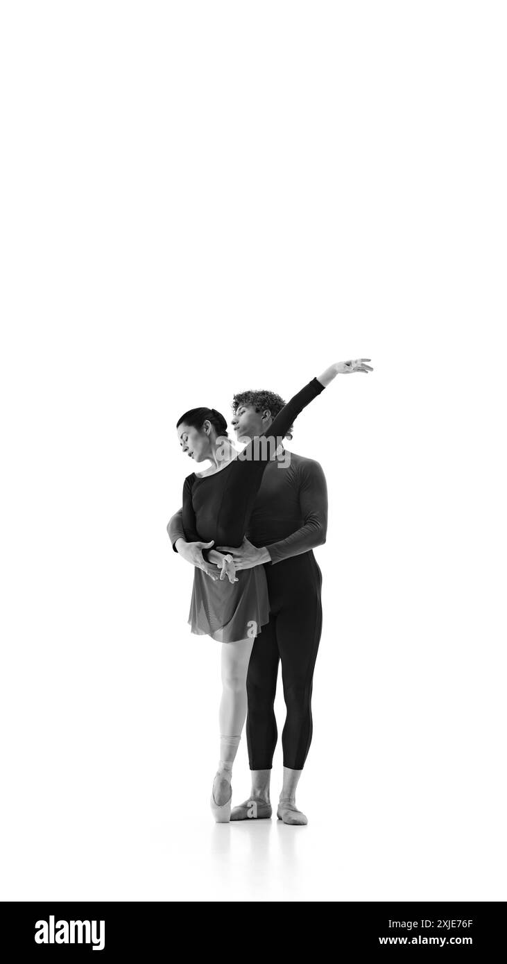 Duo, ballet dancer and ballerina perfecting their elegant moves against ...