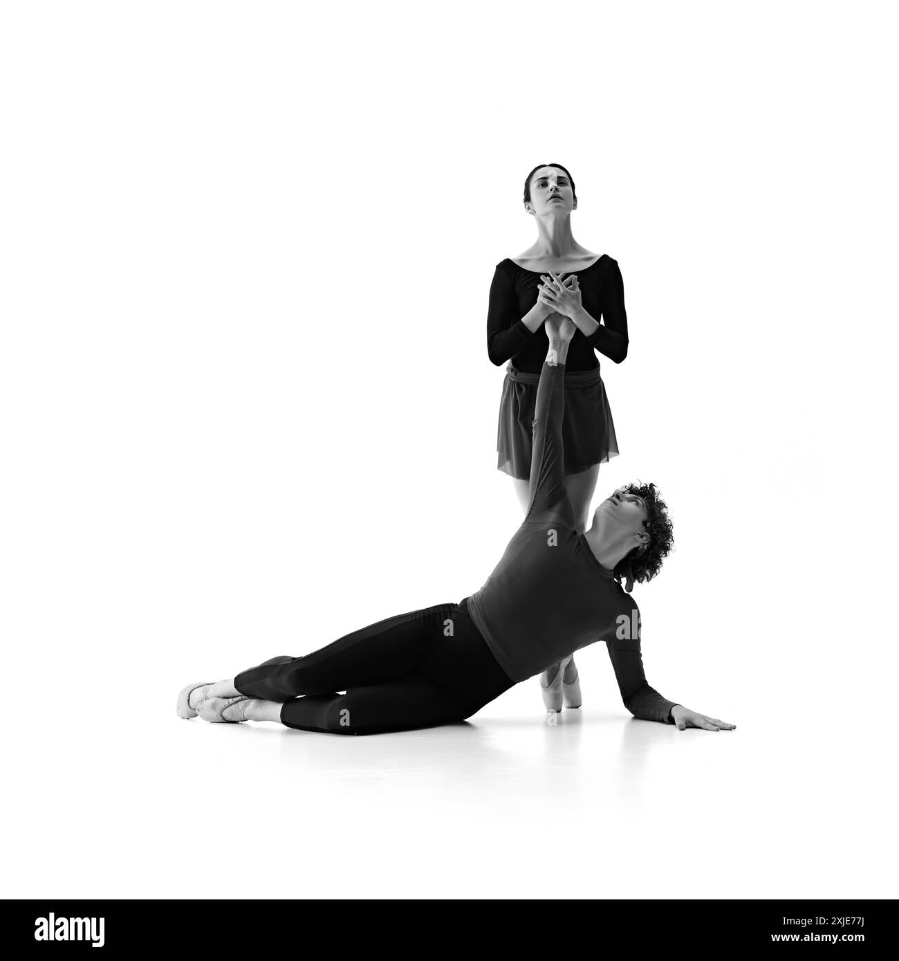 Ballet partners in powerful pose shows strength, balance, and grace in ...