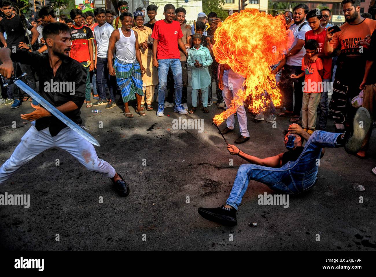 Indian Shiite Muslim fire eaters perform stunts on the occasion of ...