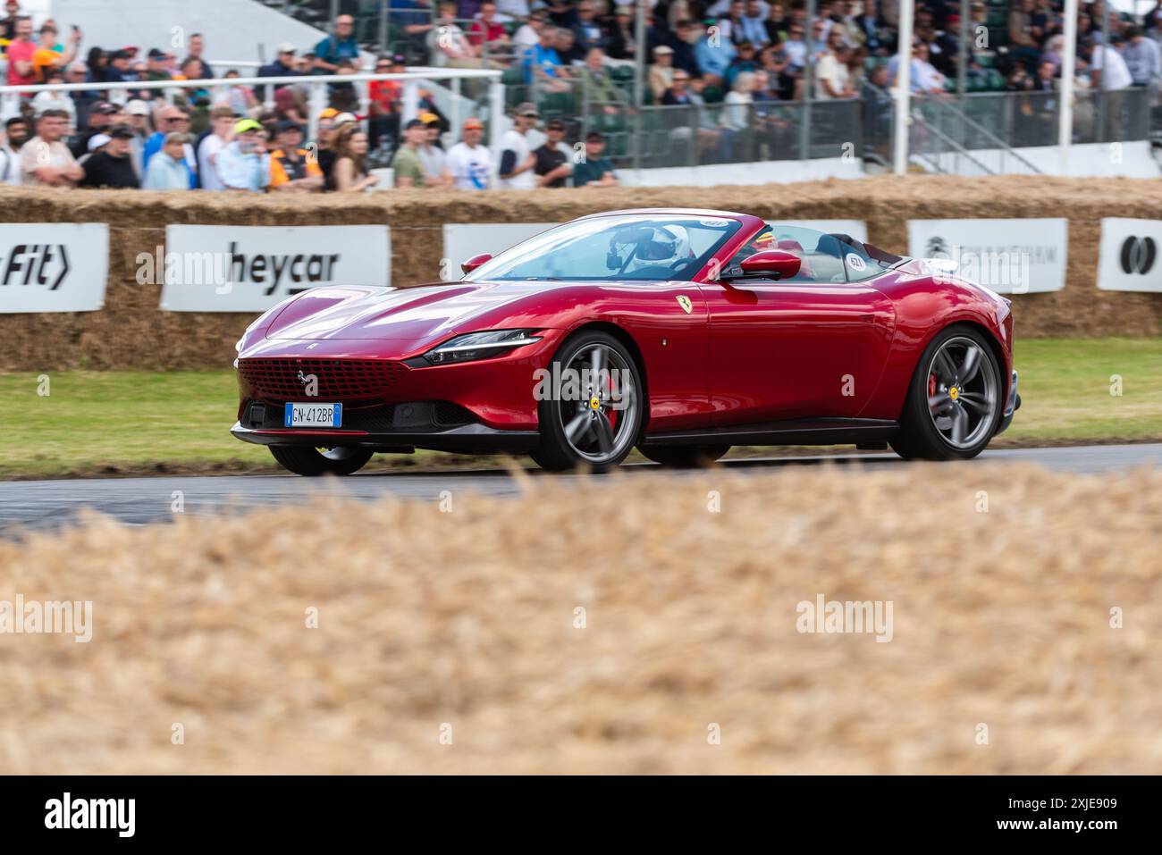 2024 Ferrari Roma Spider soft top gt car driving up the hill climb ...