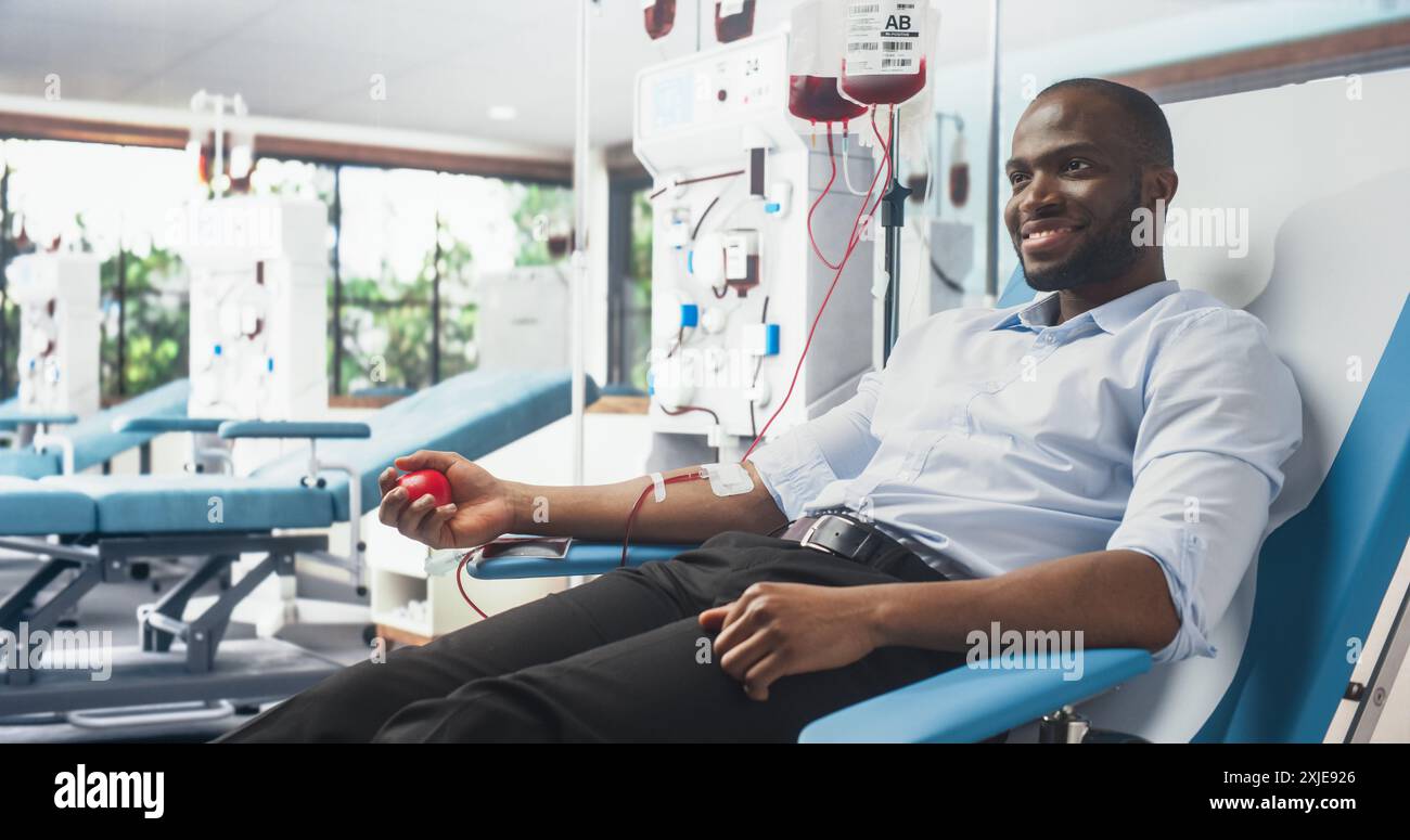 Black businessman donating blood in hi-res stock photography and images ...