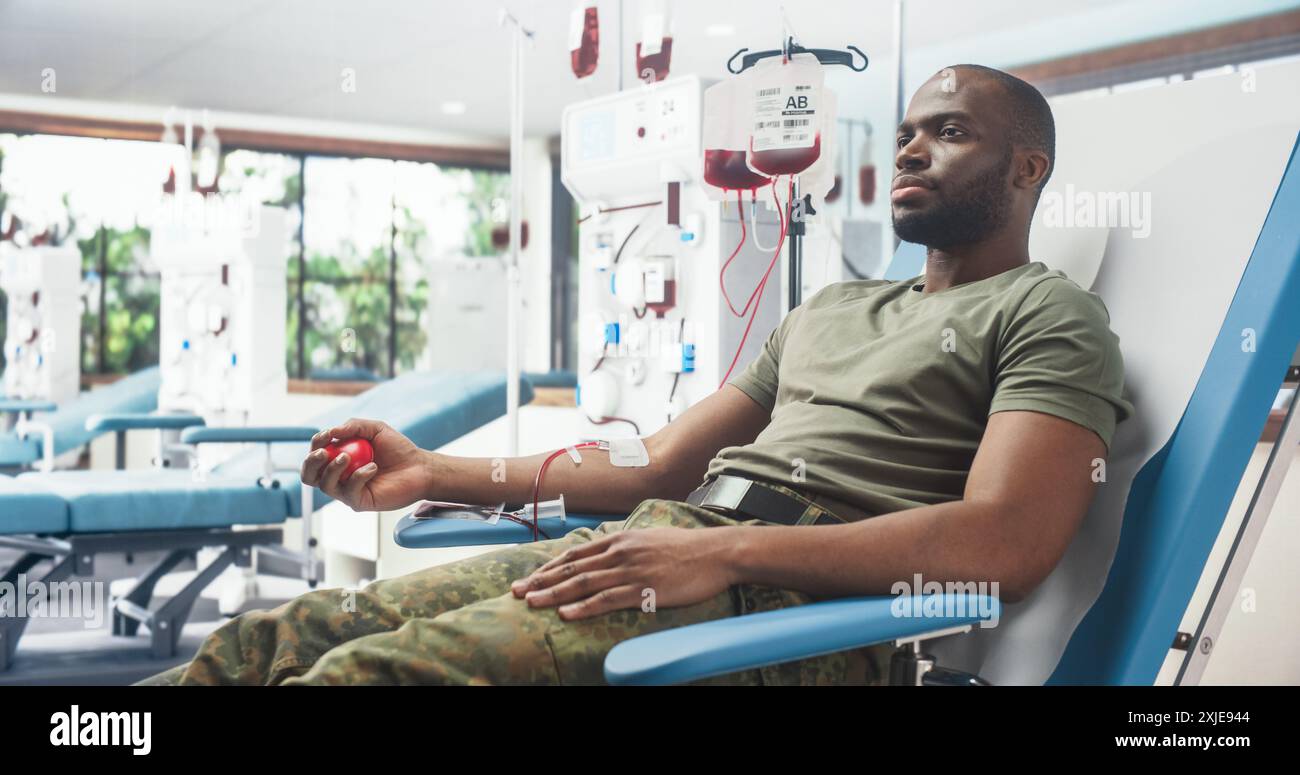 Black Male Army Soldier Donating Blood For Injured Comrades In Military ...