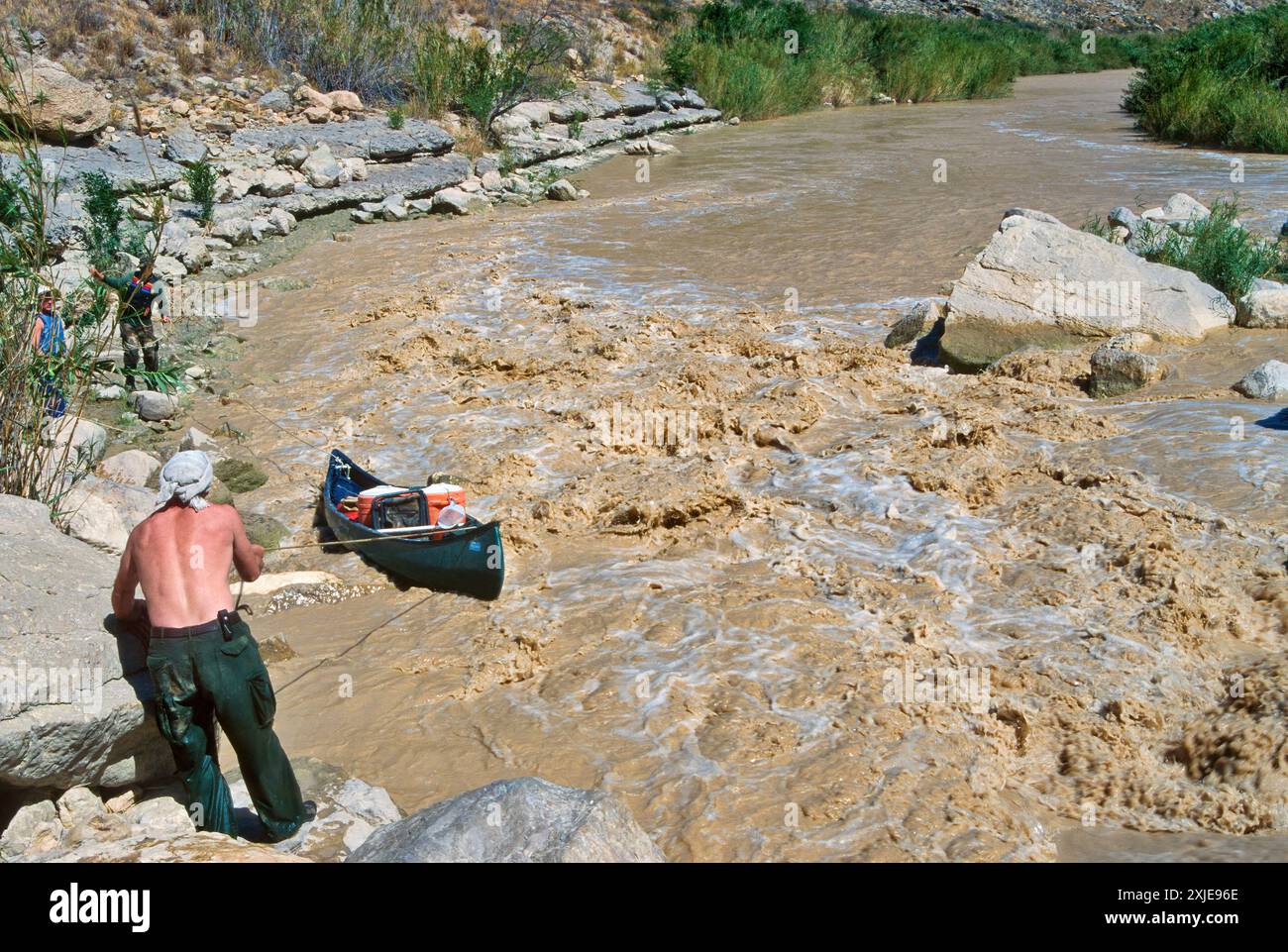 Lining canoe at Lower Madison Falls at Rio Grande, Bullis Canyon, The ...