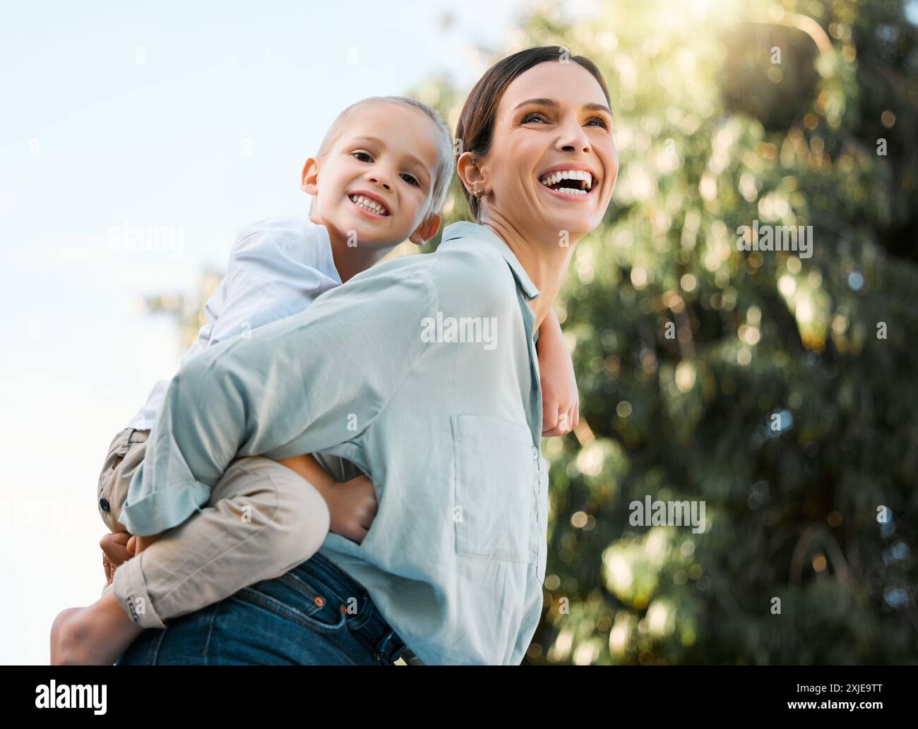 Portrait, mom and piggyback boy in outdoor for bonding activity ...