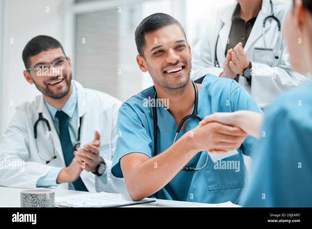 Hospital, clapping or doctors shaking hands for interview, good job or promotion success in ...
