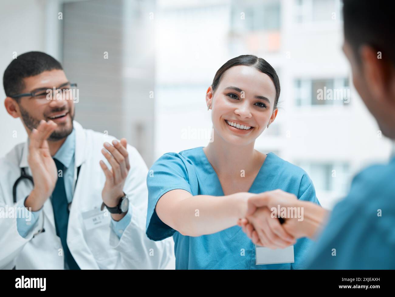 Happy people, clapping or doctors shaking hands for interview, good job or promotion success in ...