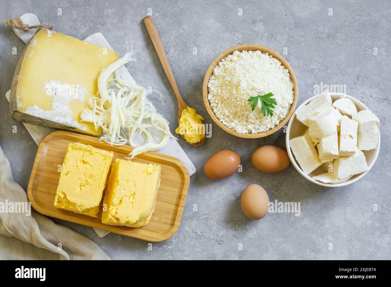 Delicatessen concept, different kinds of cheese and butter, cheddar ...