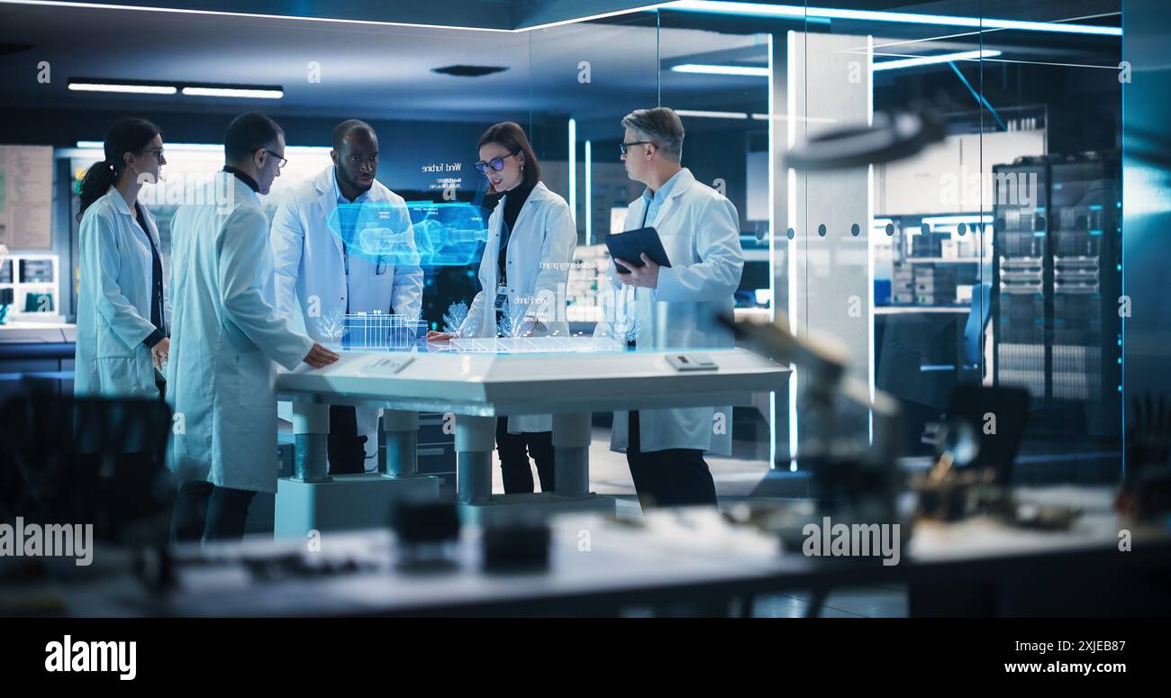 Diverse Team of Industrial Engineers Using Futuristic Hologram of Wind ...