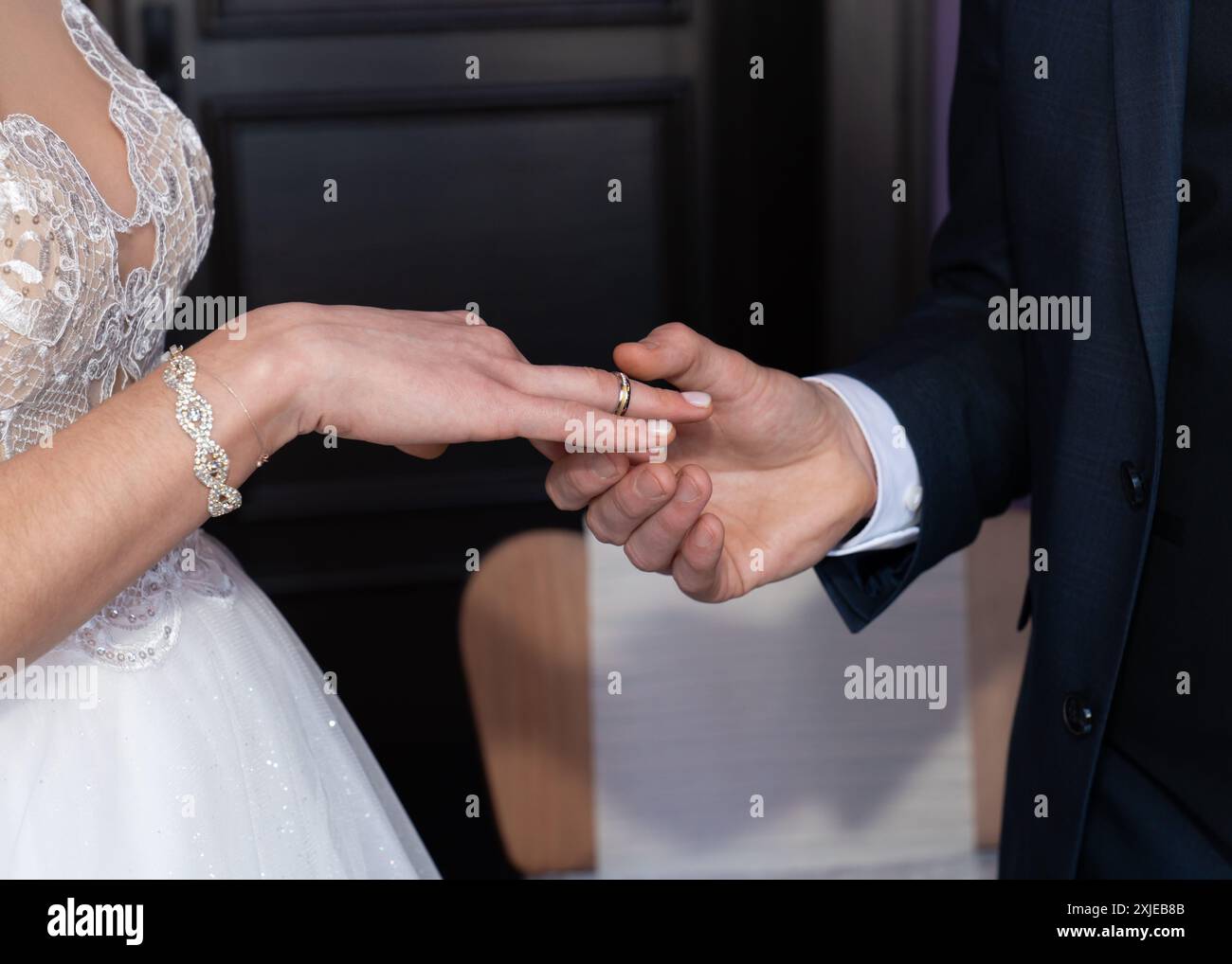 Woman puts on wedding ring hi-res stock photography and images - Alamy