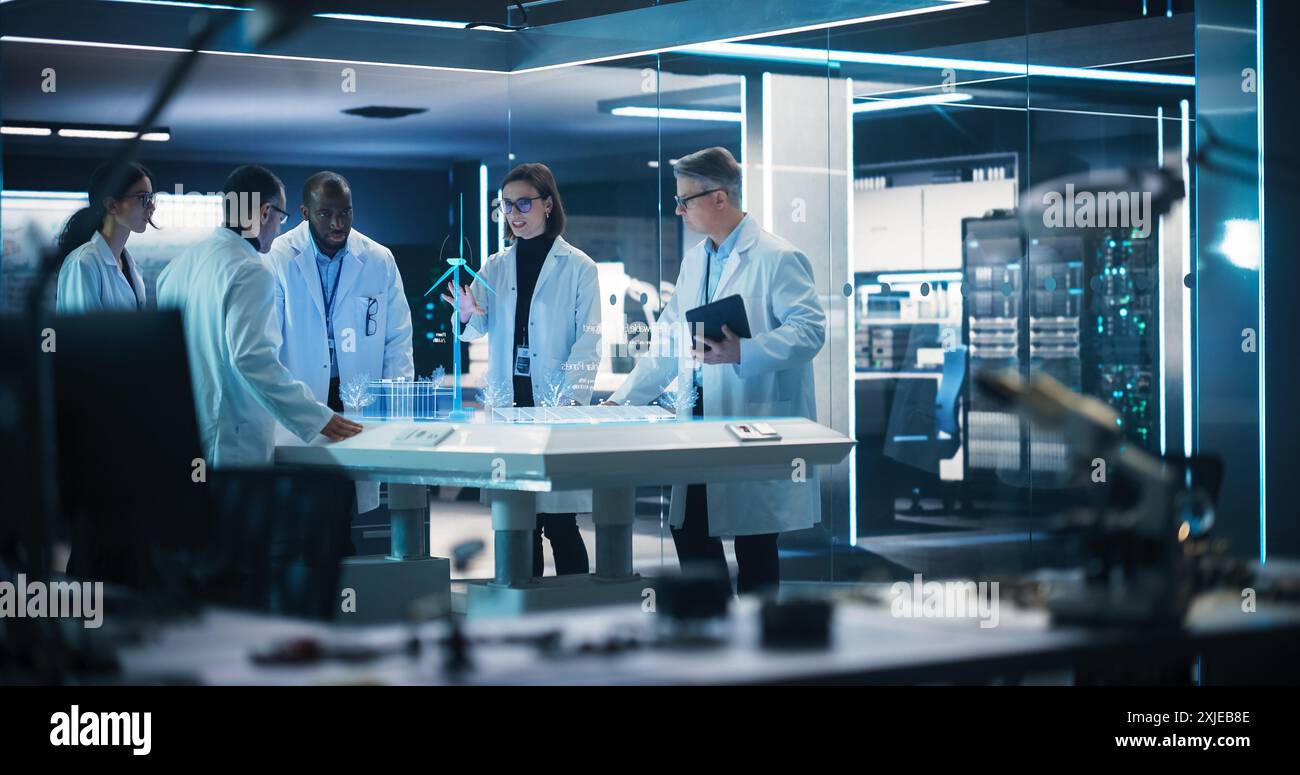 Diverse Team of Industrial Engineers Using Futuristic Hologram of Wind ...