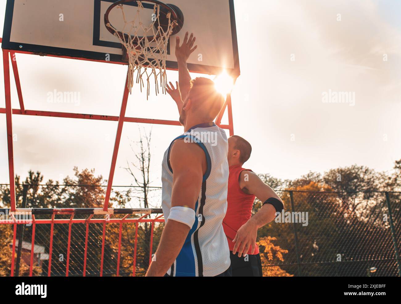 Two friends playing basketball on hi-res stock photography and images ...