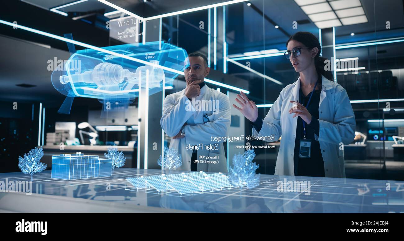 Male And Female Industrial Engineers Using Futuristic Hologram of Wind ...