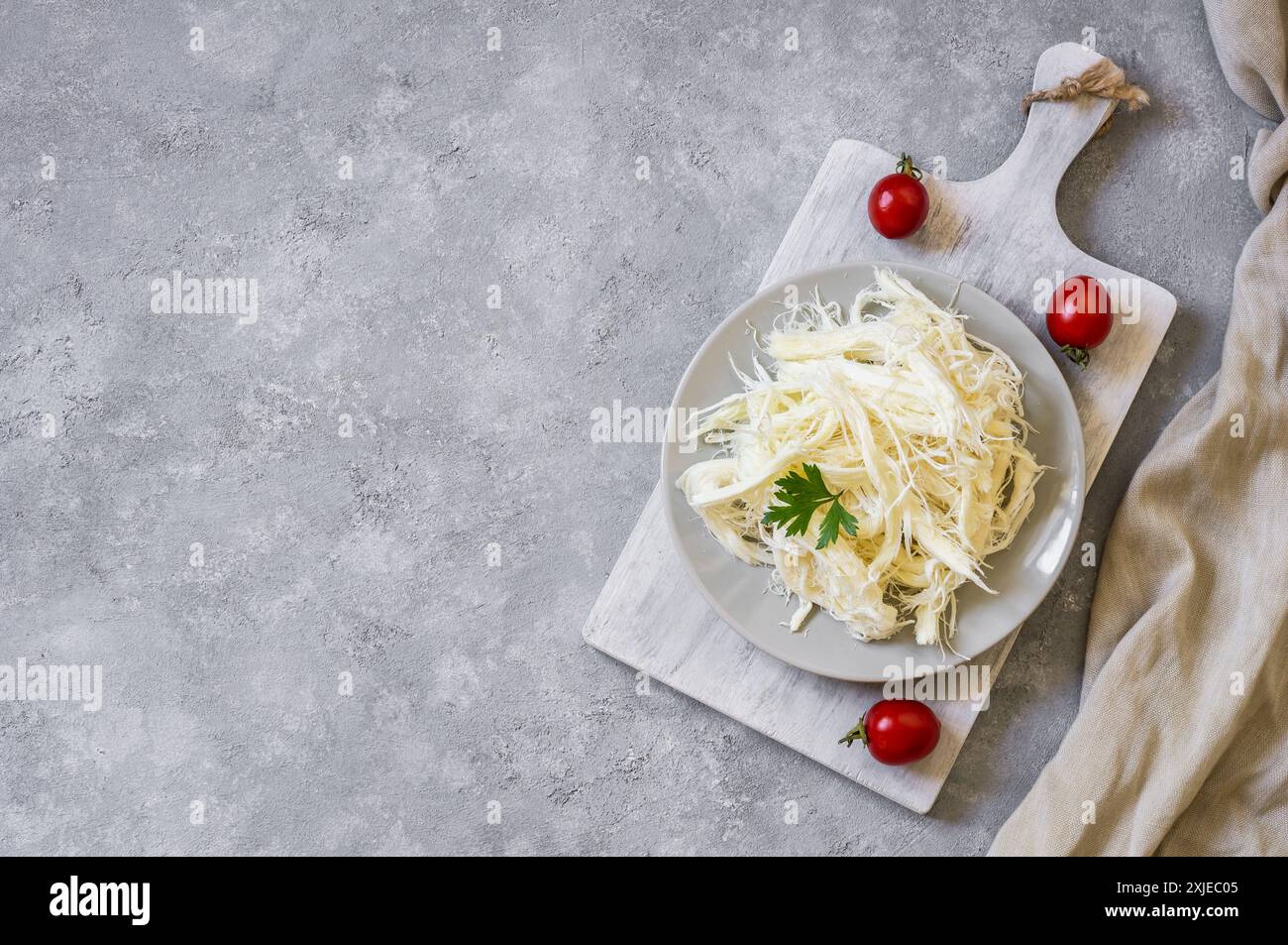 Turkish traditional homemade checil or string cheese on plate, healthy ...